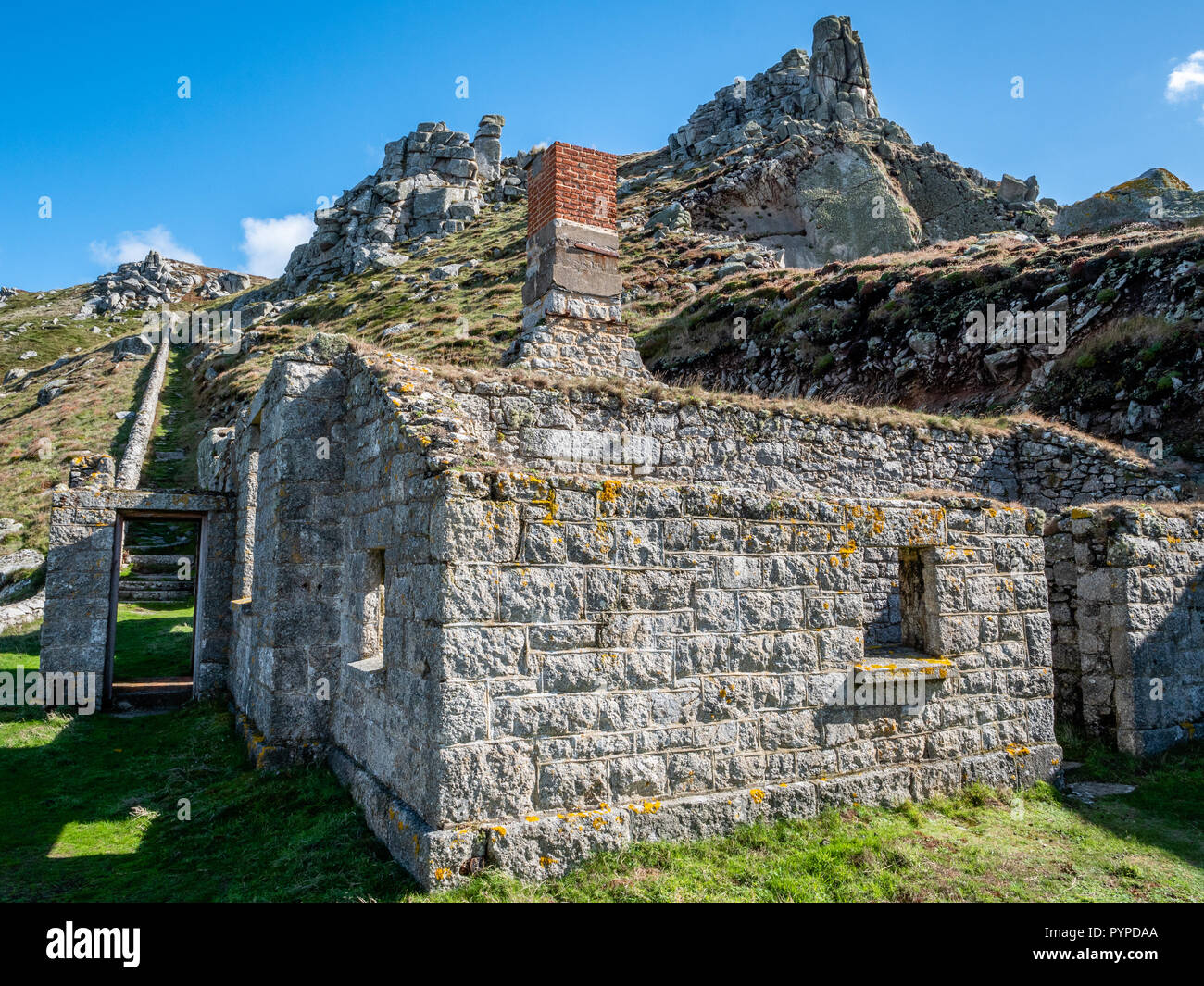 Ruins of The Battery on the rugged west coast of Lundy Island off the ...
