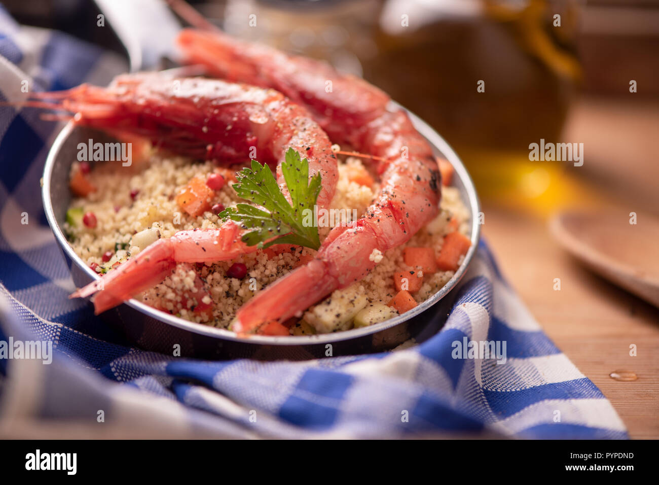Fish couscous with prawns Stock Photo - Alamy