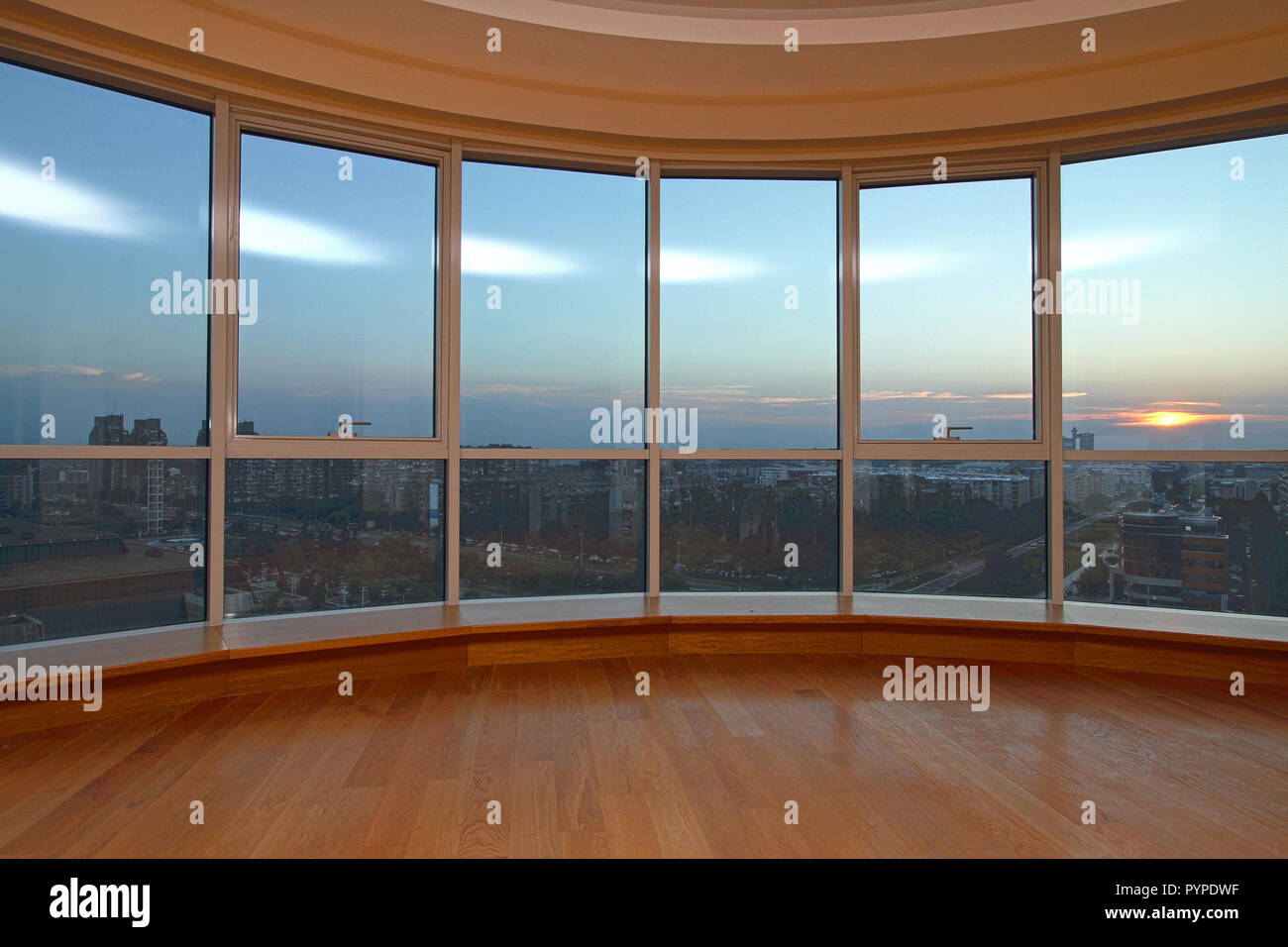 Big glass wall with cityscape view Stock Photo - Alamy