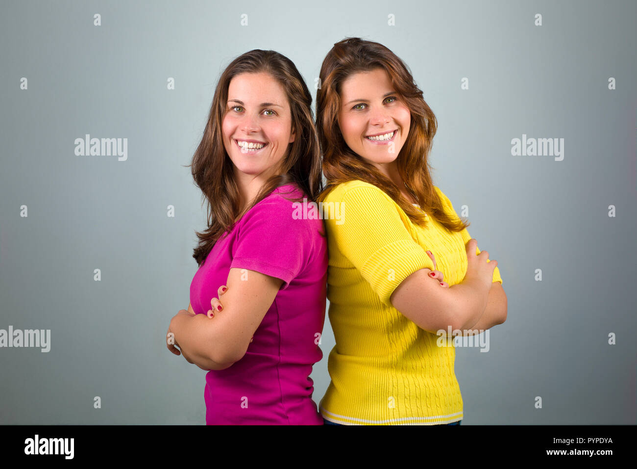 Two twin sisters looking at hi-res stock photography and images - Alamy