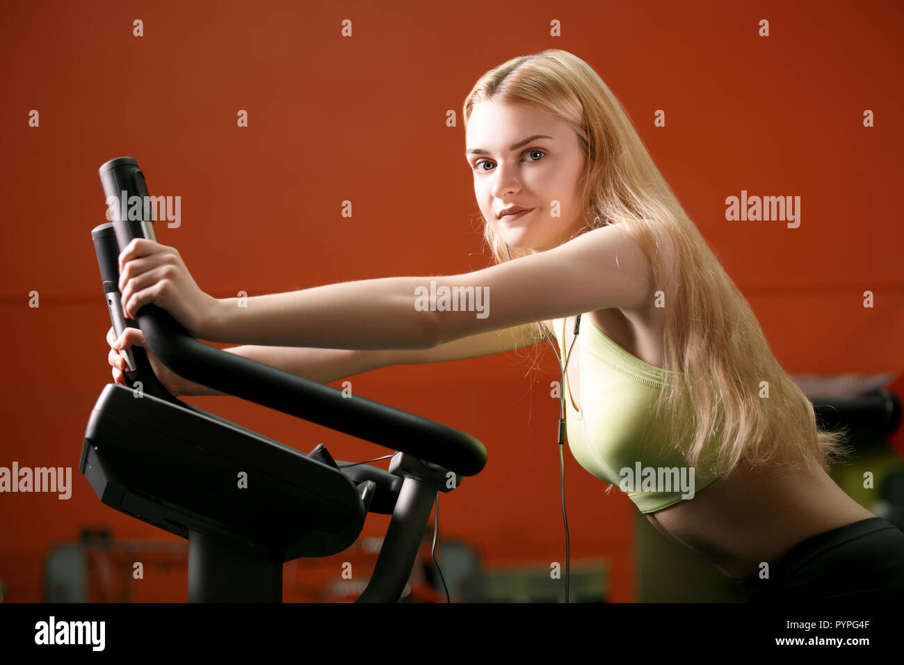 Woman exercise bike gym intense hi-res stock photography and images - Alamy