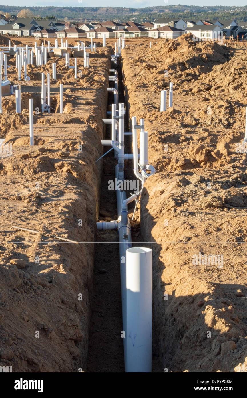 Foundation work at new housing development showing all of the sewer and ...