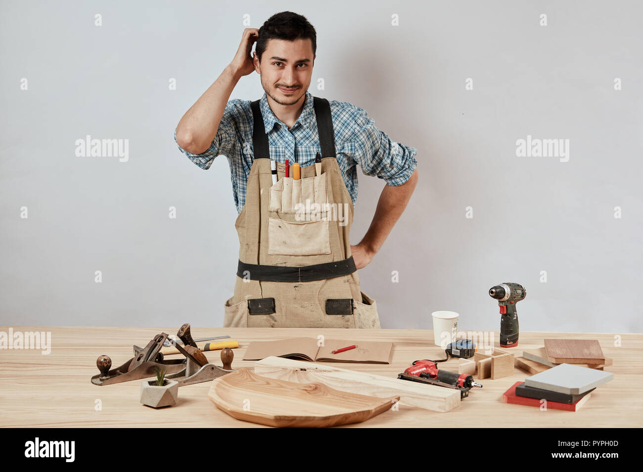 Portrait confused mechanic hi-res stock photography and images - Alamy