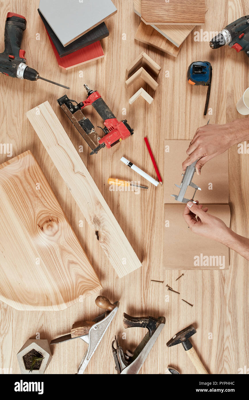 Set of carpenter's tools on wooden background Stock Photo - Alamy