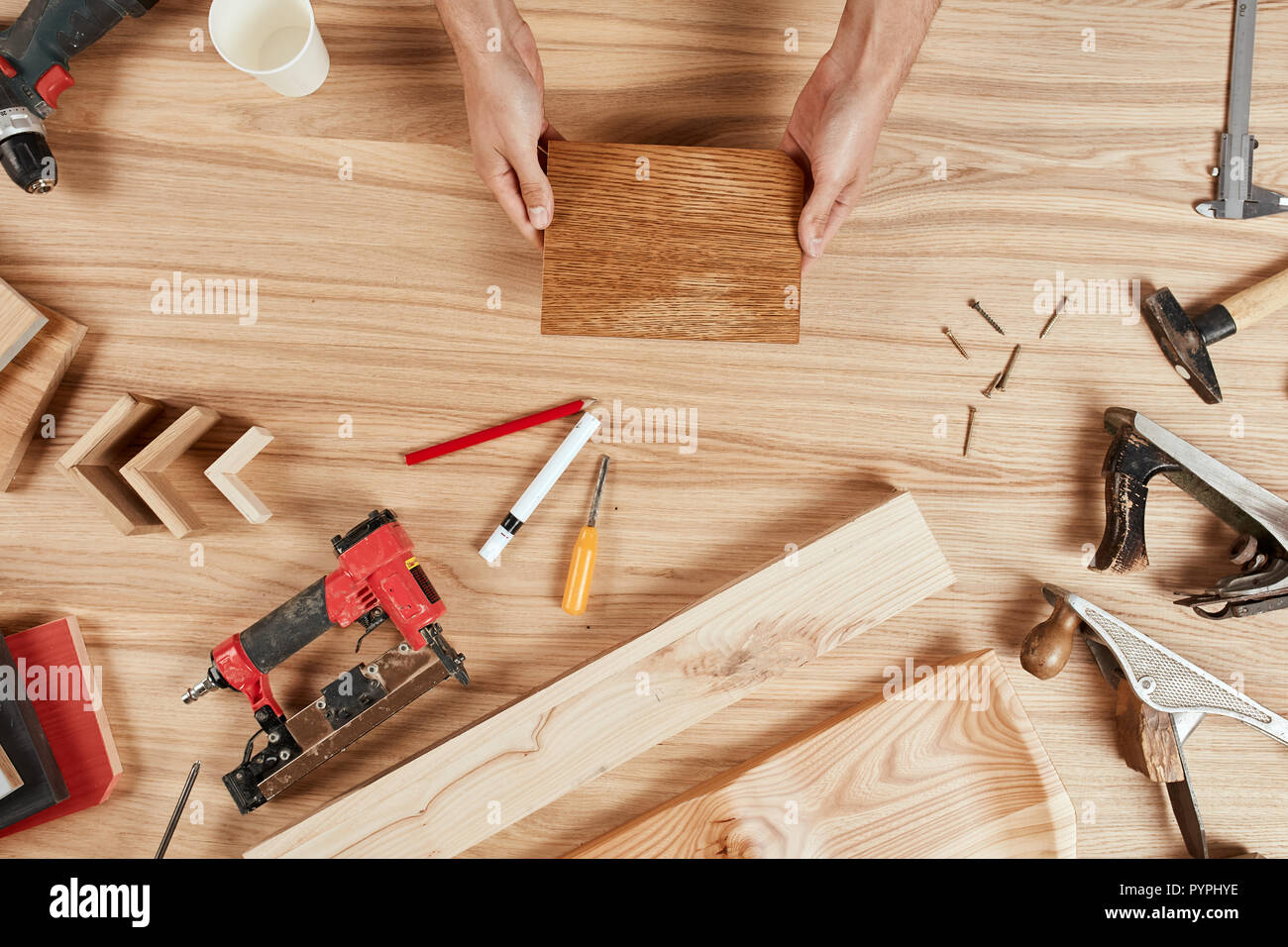 Set of carpenter's tools on wooden background Stock Photo - Alamy