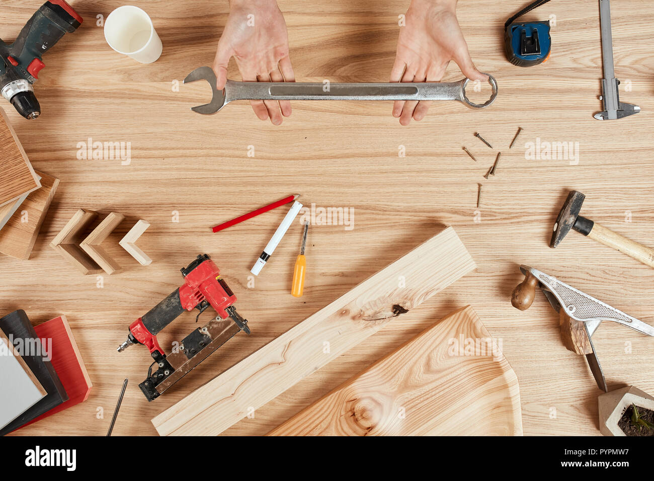 Set of carpenter's tools on wooden background Stock Photo - Alamy