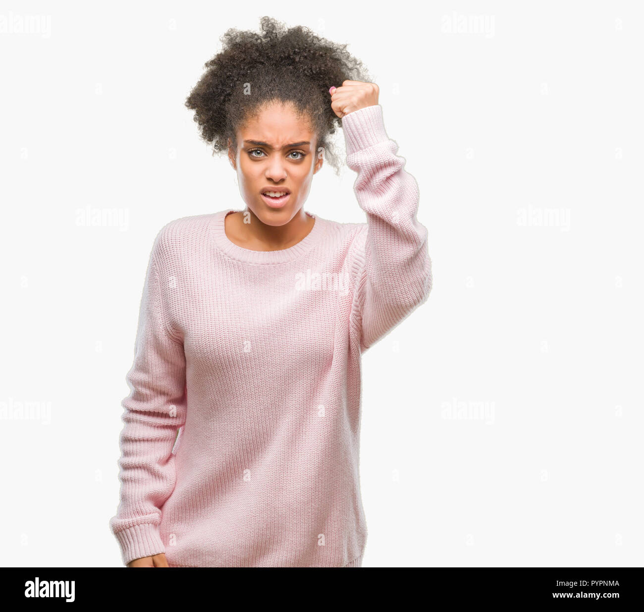 Young afro american woman wearing winter sweater over isolated ...