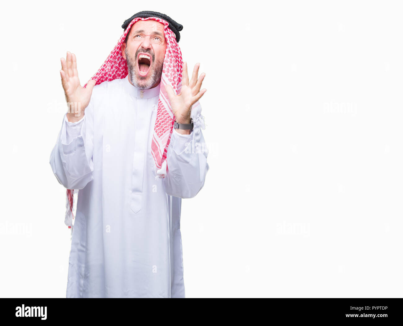 Senior arab man wearing keffiyeh over isolated background crazy and mad ...