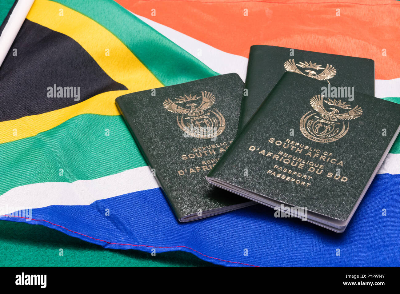 South African passports on SA flag Stock Photo - Alamy