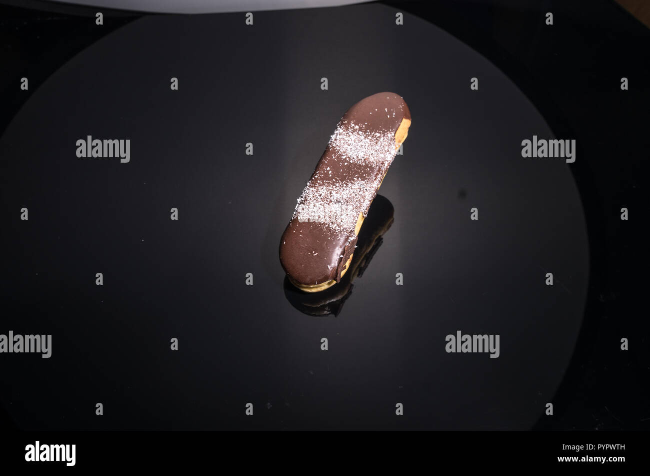 Oblong oval cake on a black background. One cake. Top Stock Photo - Alamy