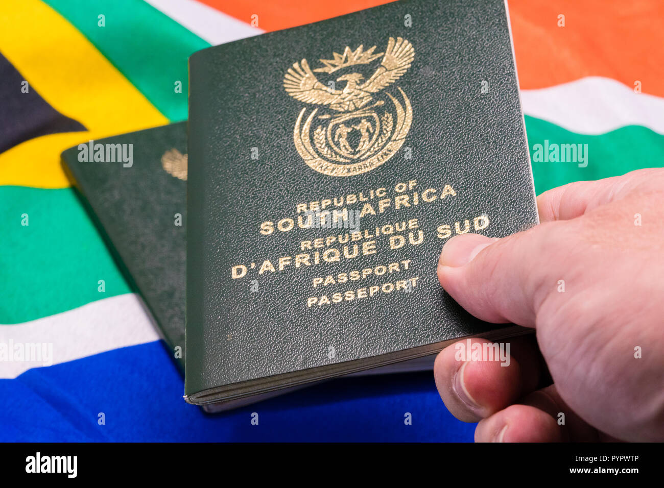 Holding south african passport hi-res stock photography and images - Alamy
