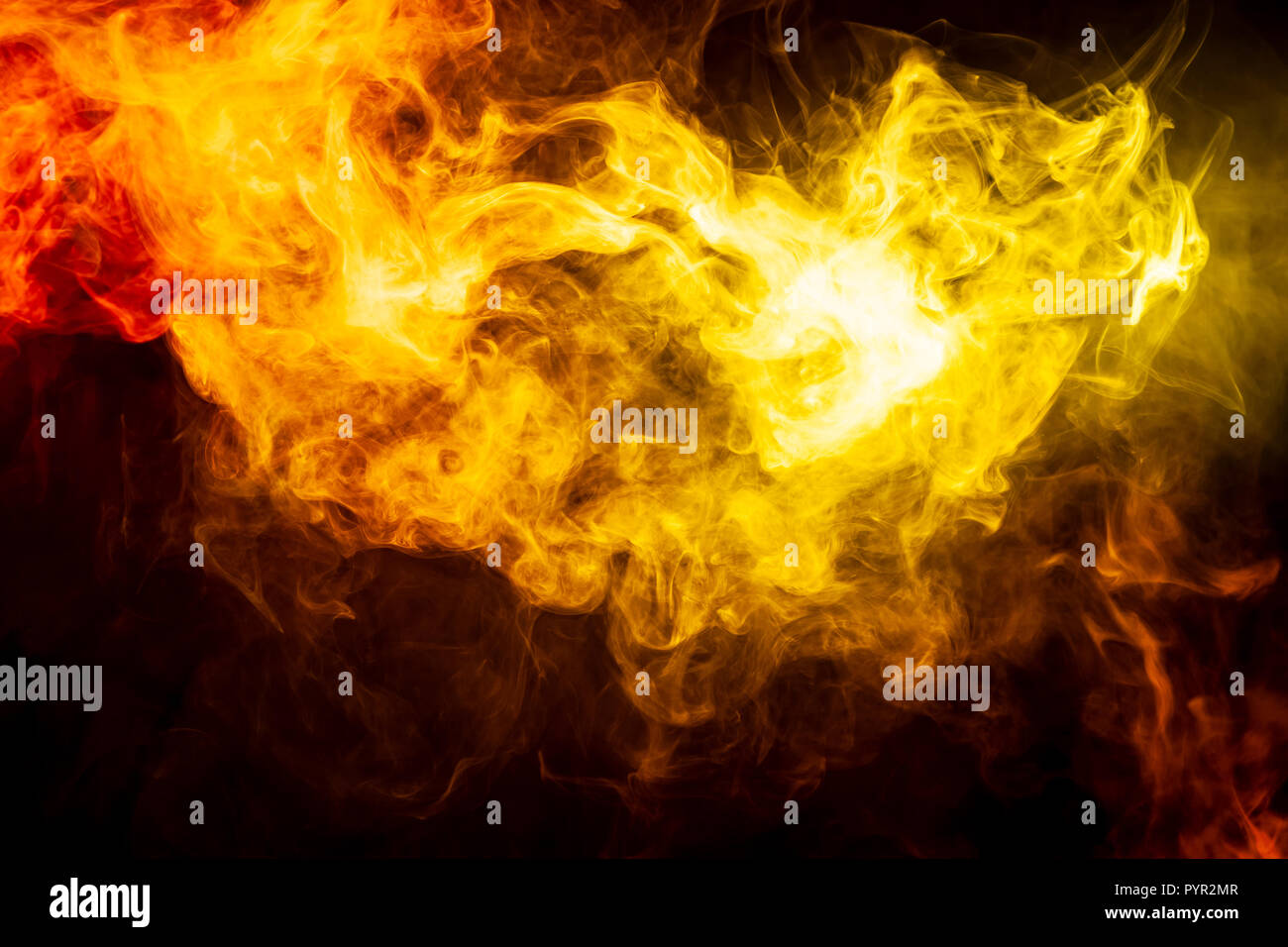 Fire flames background. Colorful fiery smoke on a black isolated ...