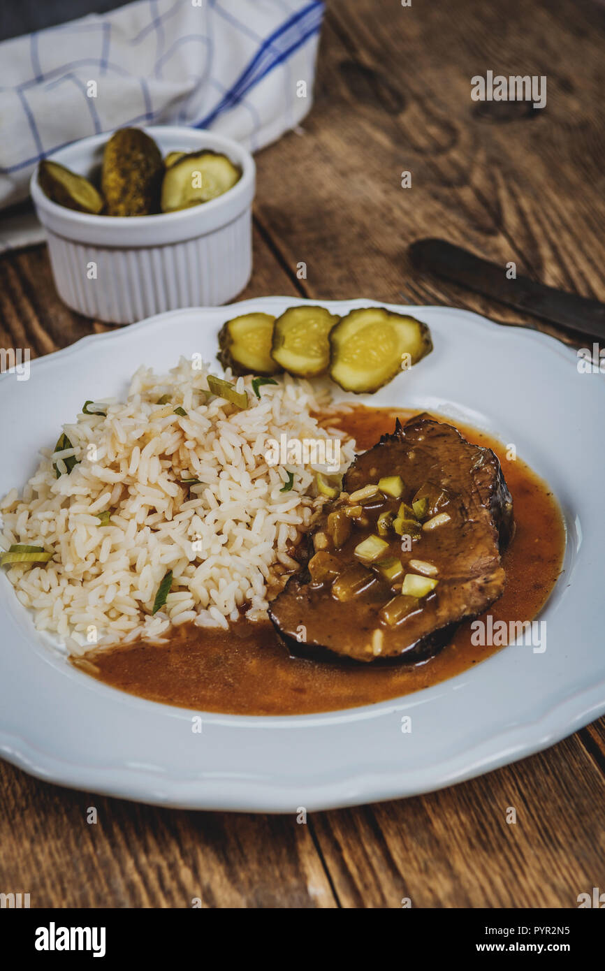 Czech traditional food Znojmo's sauce with gherkin and pork meat and ...