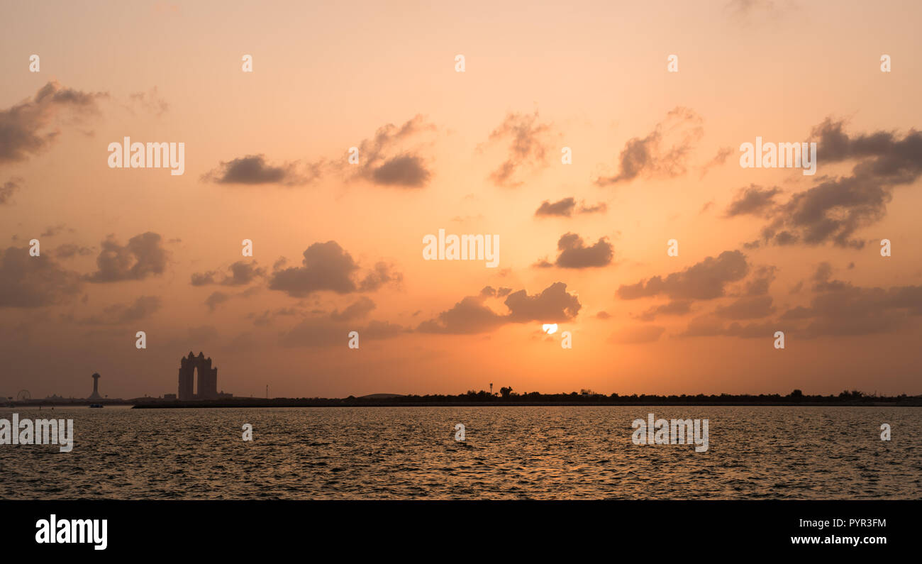 Sunset at Corniche beach during heavy dark clouds Stock Photo - Alamy