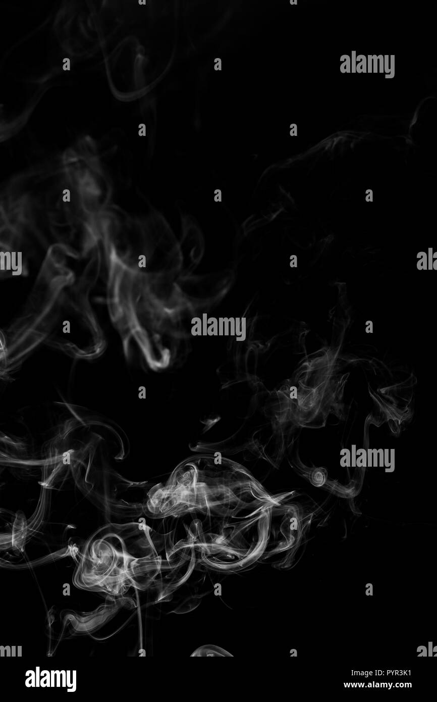 The abstract figure of the smoke on a black background Stock Photo - Alamy