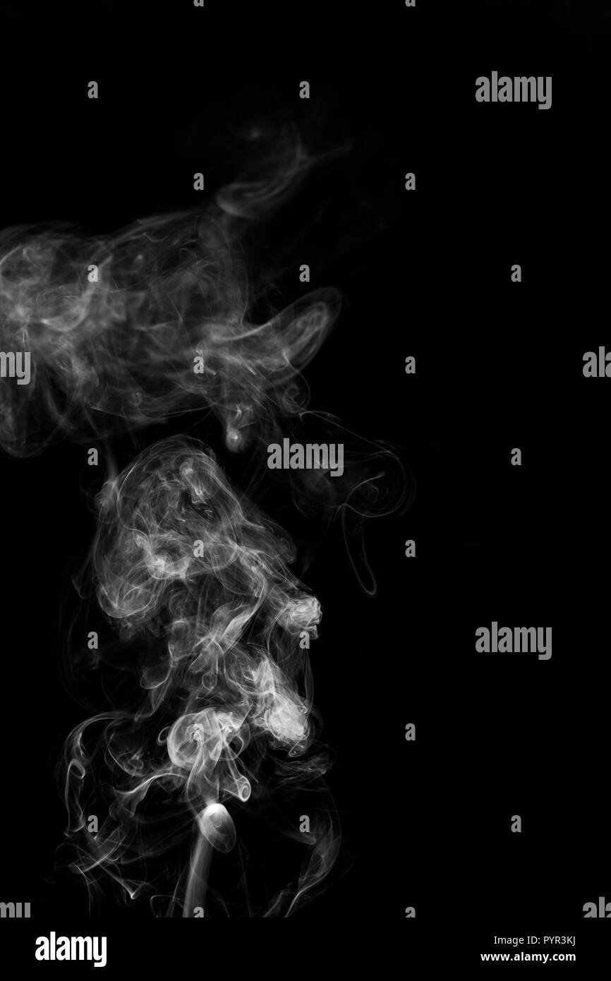 The abstract figure of the smoke on a black background Stock Photo - Alamy