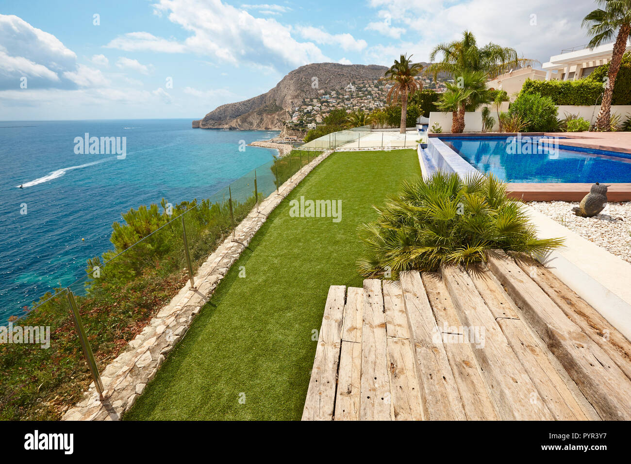 Spanish mediterranean coastline with swimming pool. Alicante. Summer in ...