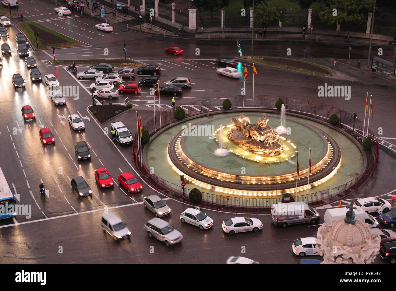 MADRID - OCTOBER 24: People drive downtown on October 24, 2012 in ...