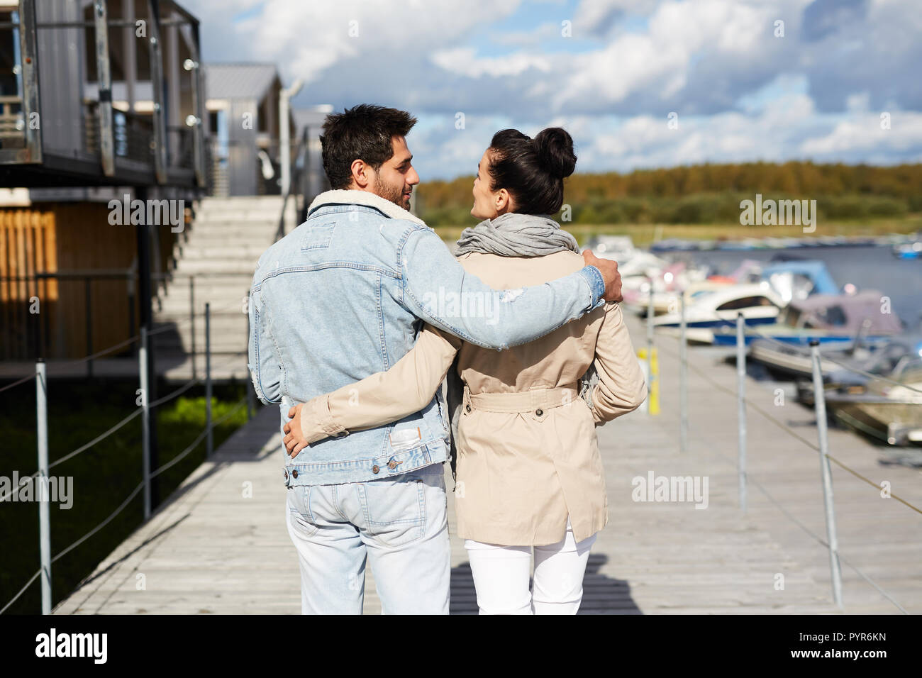 Romantic woman embracing boyfriend on hi-res stock photography and ...