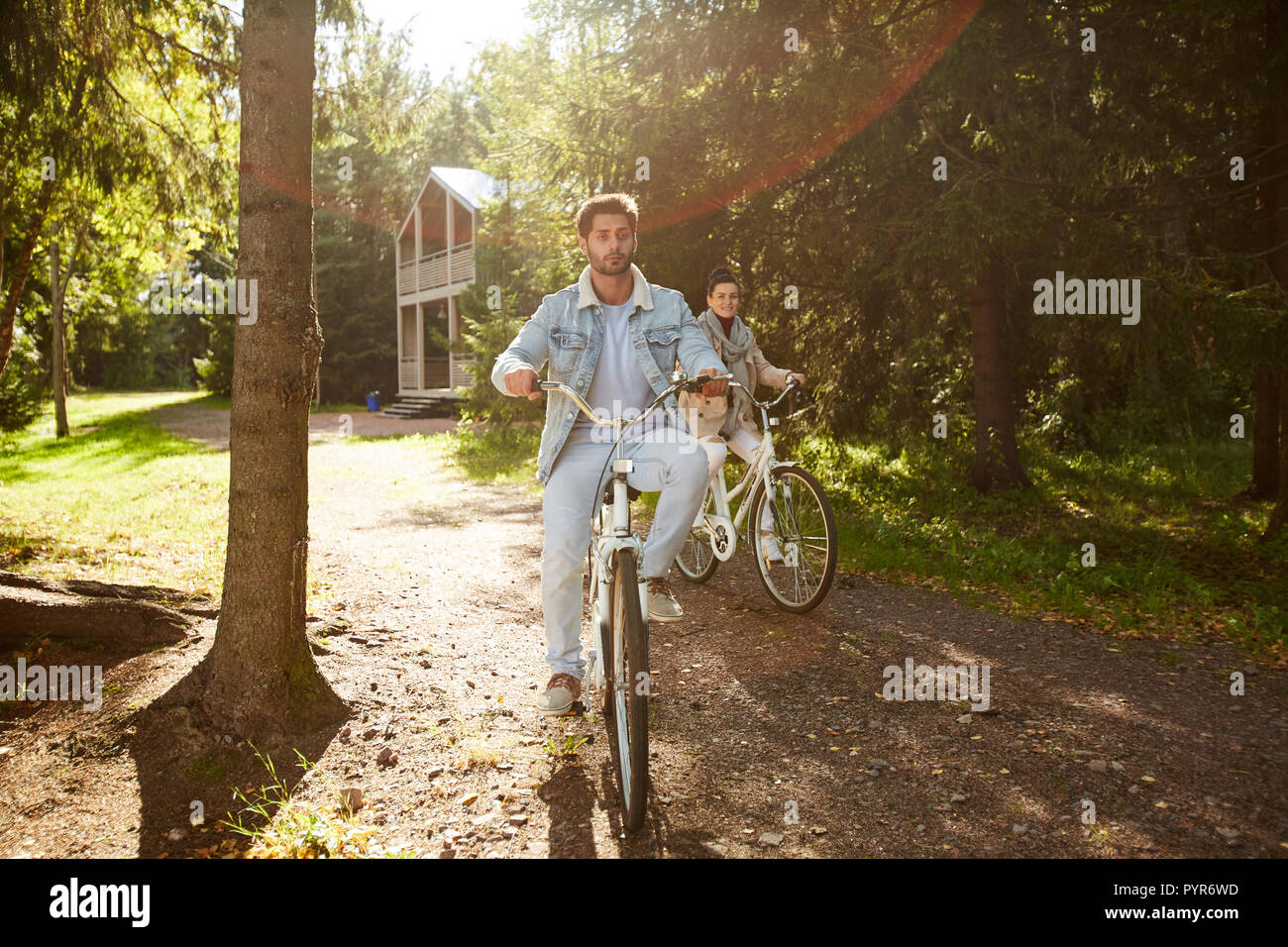 Couple man woman riding bikes hi-res stock photography and images - Alamy