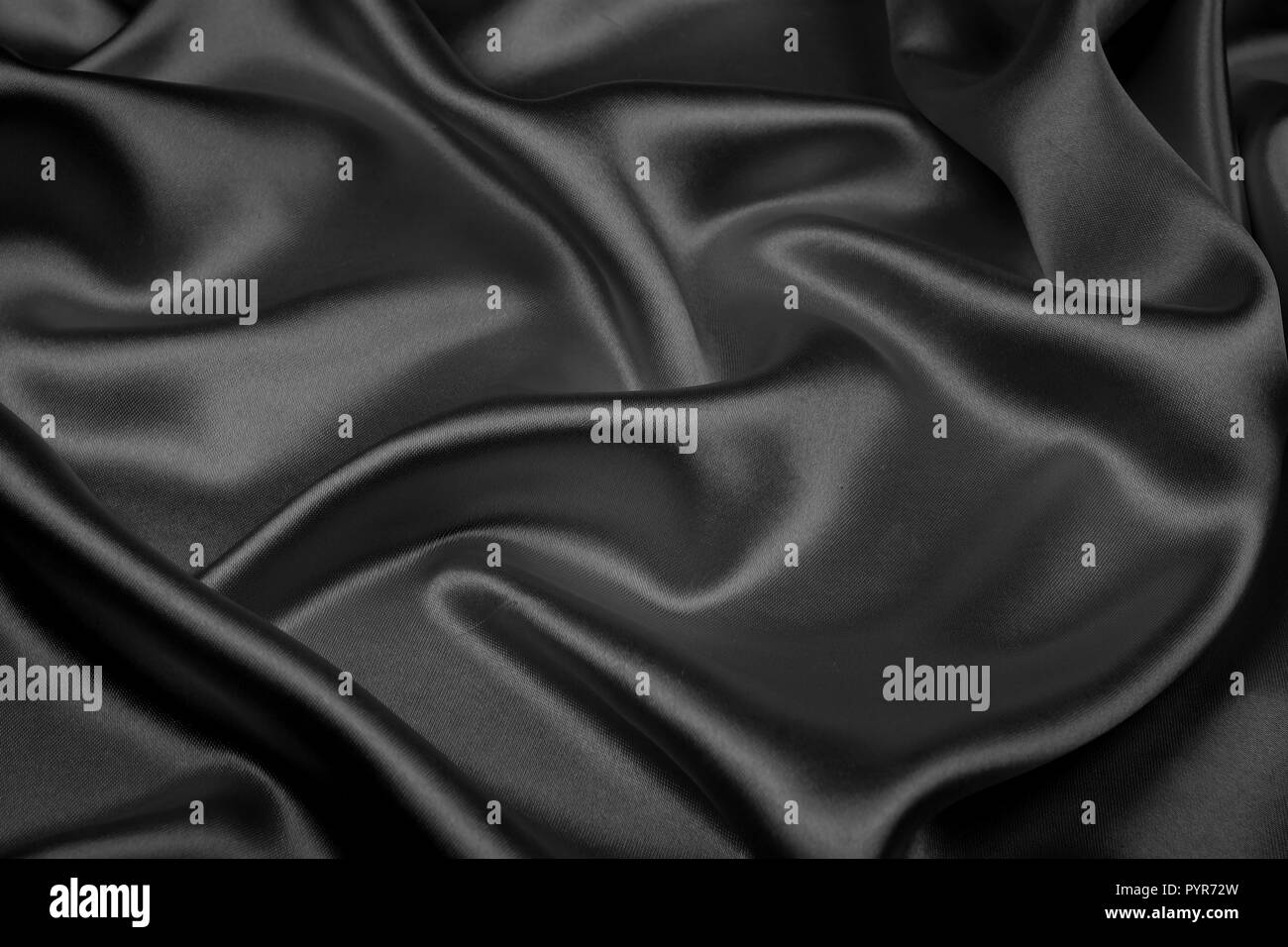 Black silk texture luxurious satin for abstract background. Dark tone ...