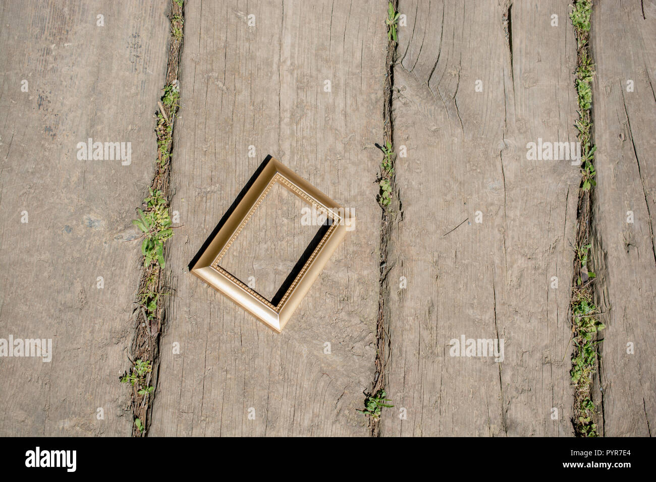Blank wooden picture frame on a background Stock Photo - Alamy