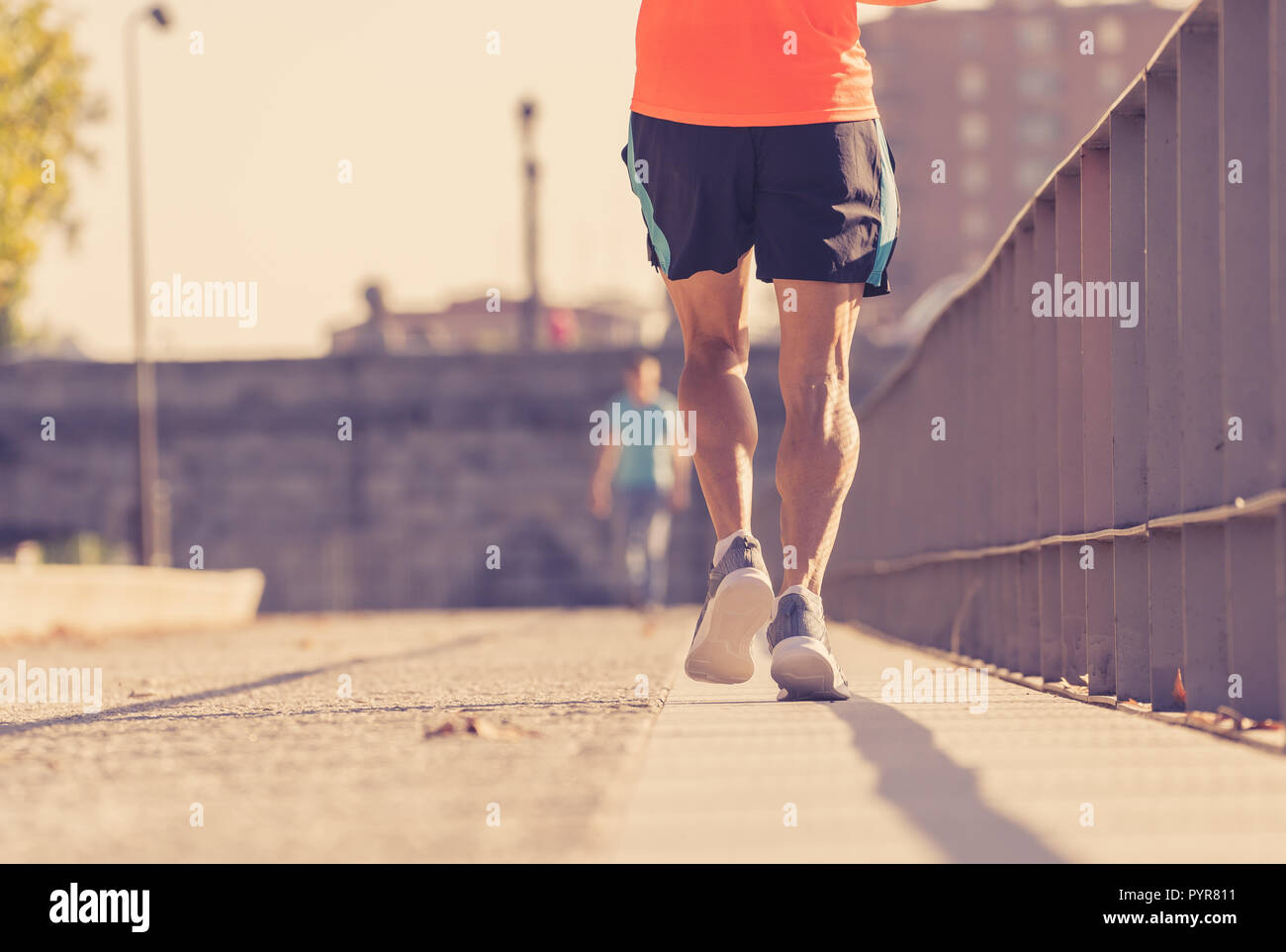 Muscle man running jogging road hi-res stock photography and images - Alamy
