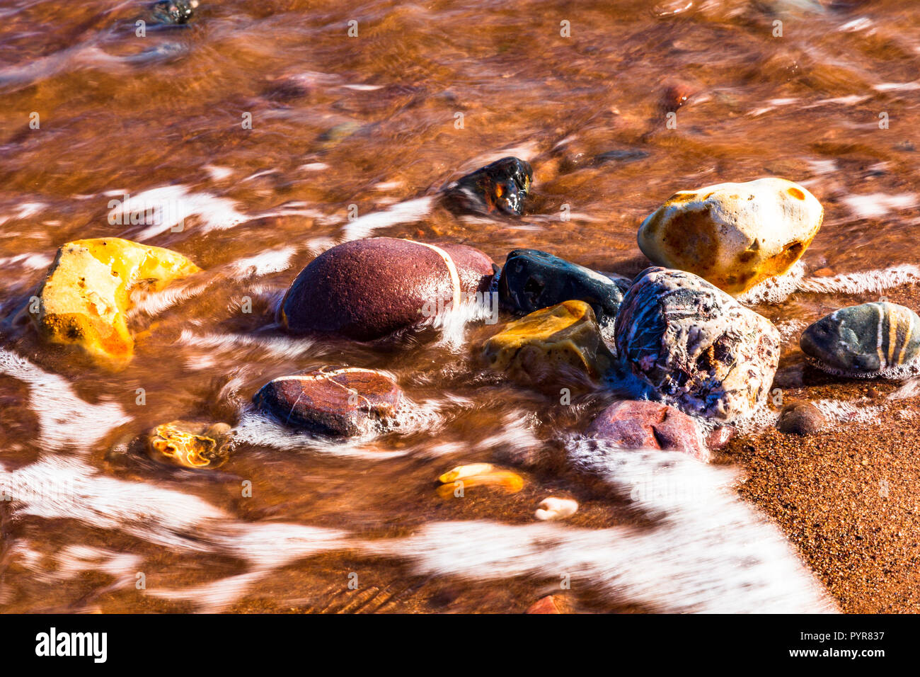 Mixed coloured pebbles hi-res stock photography and images - Alamy