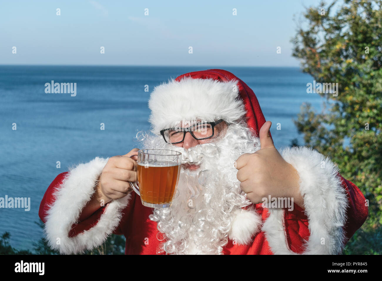 Santa claus drinking beer hi-res stock photography and images - Alamy