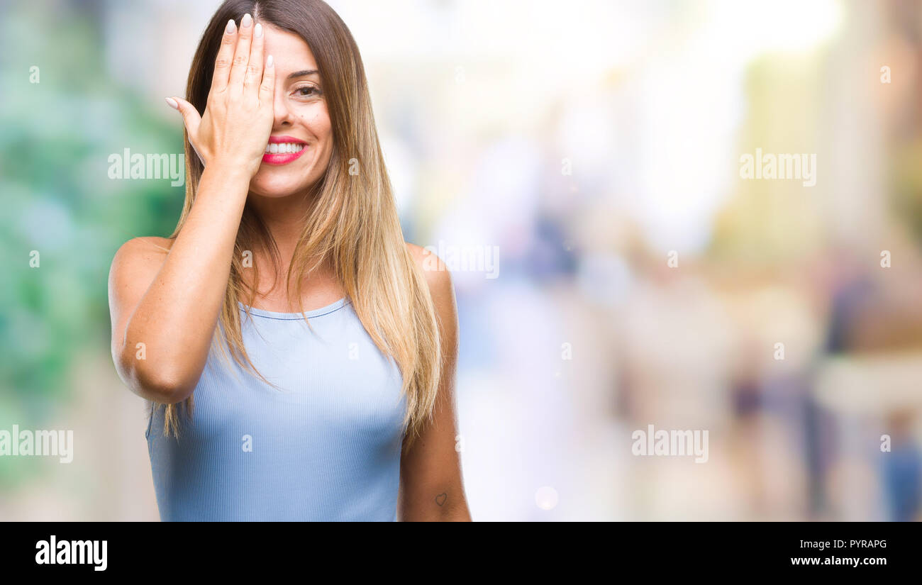 Young beautiful elegant business woman over isolated background ...