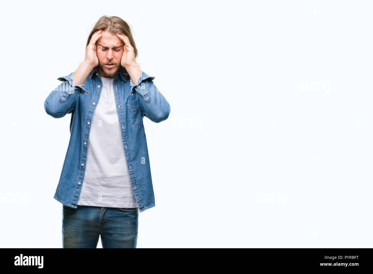 Young handsome man with long hair over isolated background with hand on ...