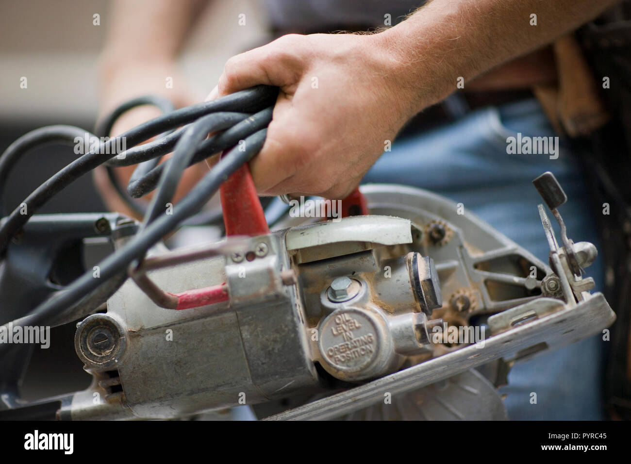 Close up man carrying tool hi-res stock photography and images - Alamy