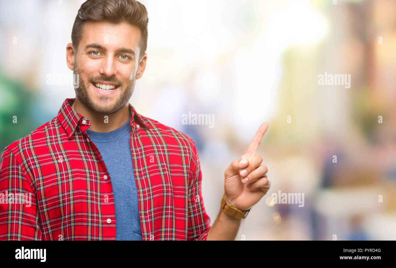 Young handsome man over isolated background with a big smile on face ...
