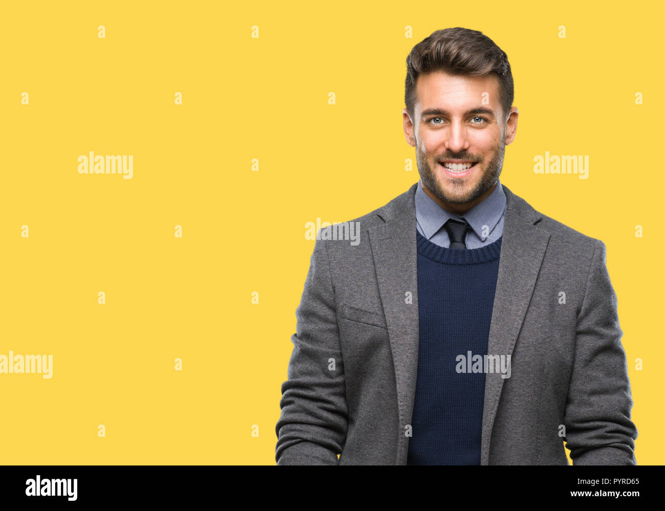 Young handsome business man over isolated background with a happy and ...