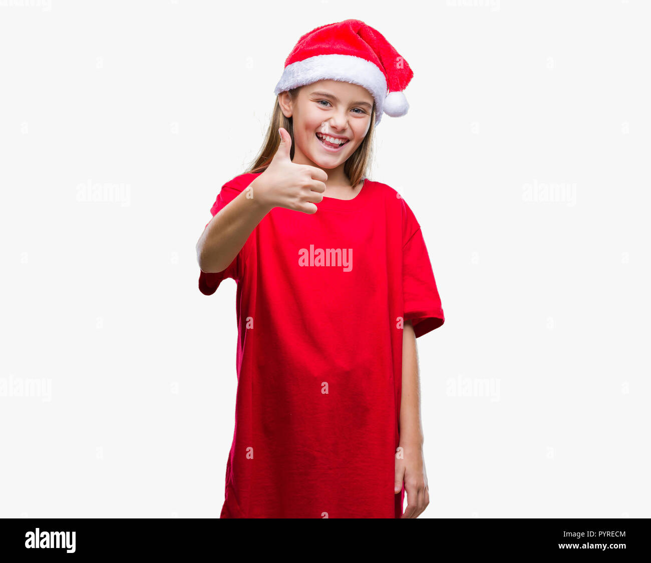 Young beautiful girl wearing christmas hat over isolated background ...