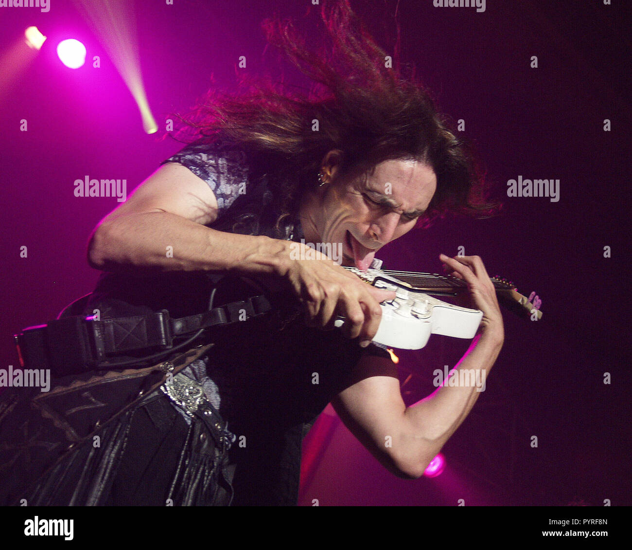 ATLANTA, GA - JULY 19: Guitarist Steve Vai plays guitar with his tongue ...