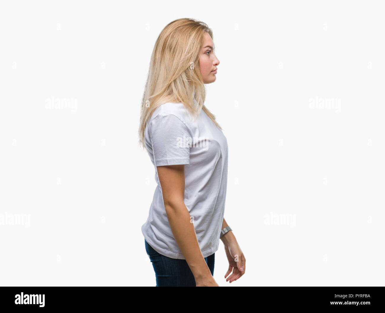 Young caucasian woman over isolated background looking to side, relax ...