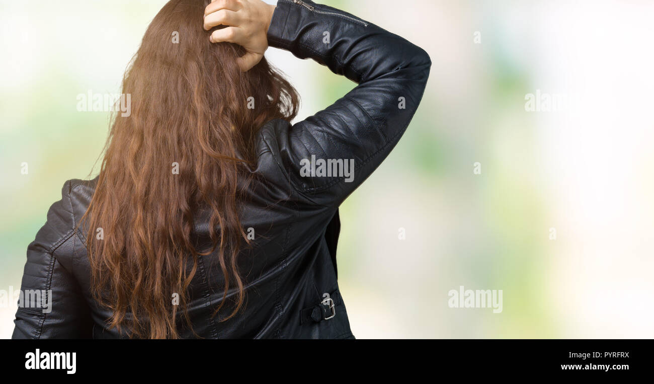 Beautiful plus size young woman wearing a fashion leather jacket over ...