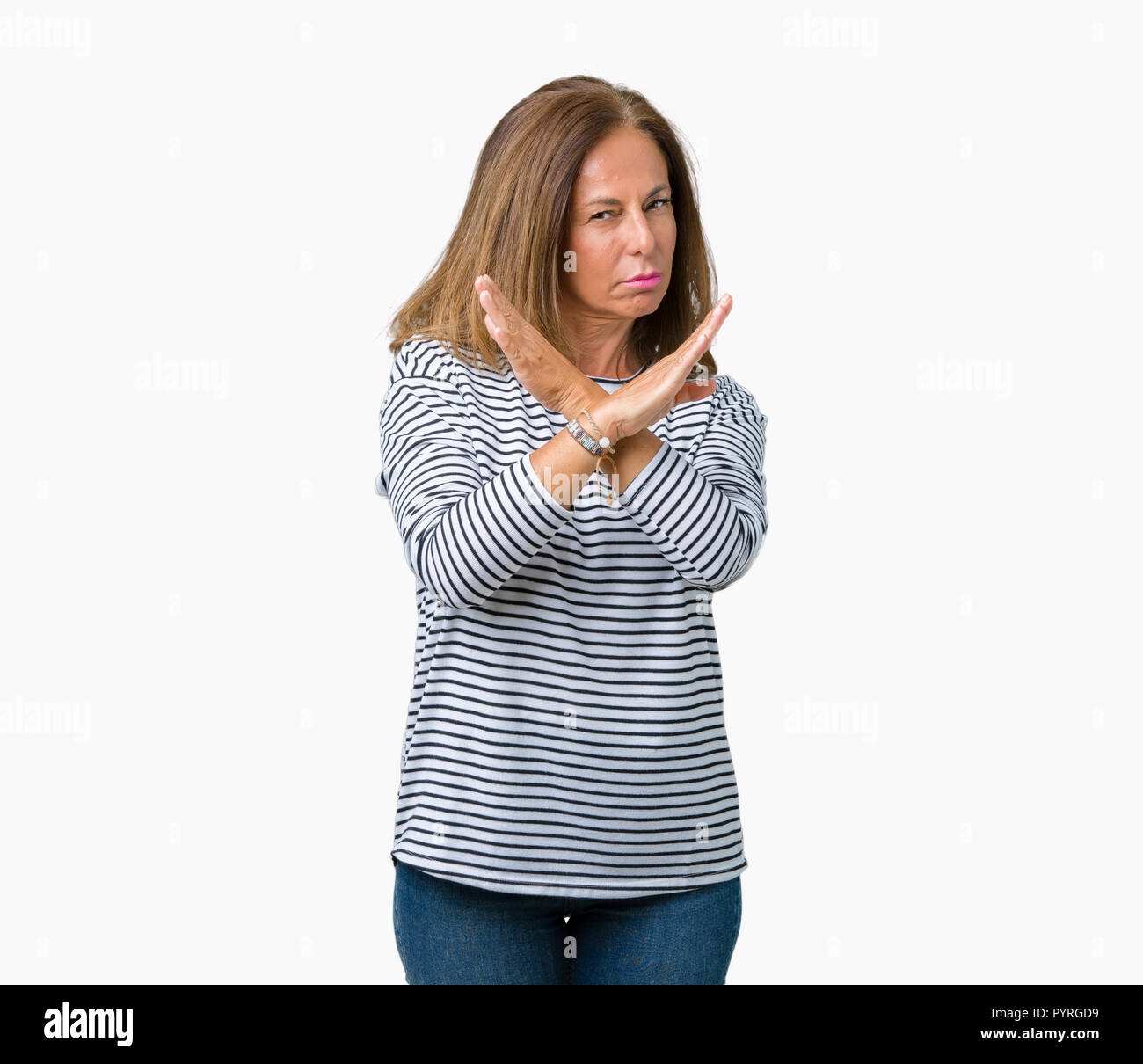 Beautiful middle age woman wearing stripes sweater over isolated ...