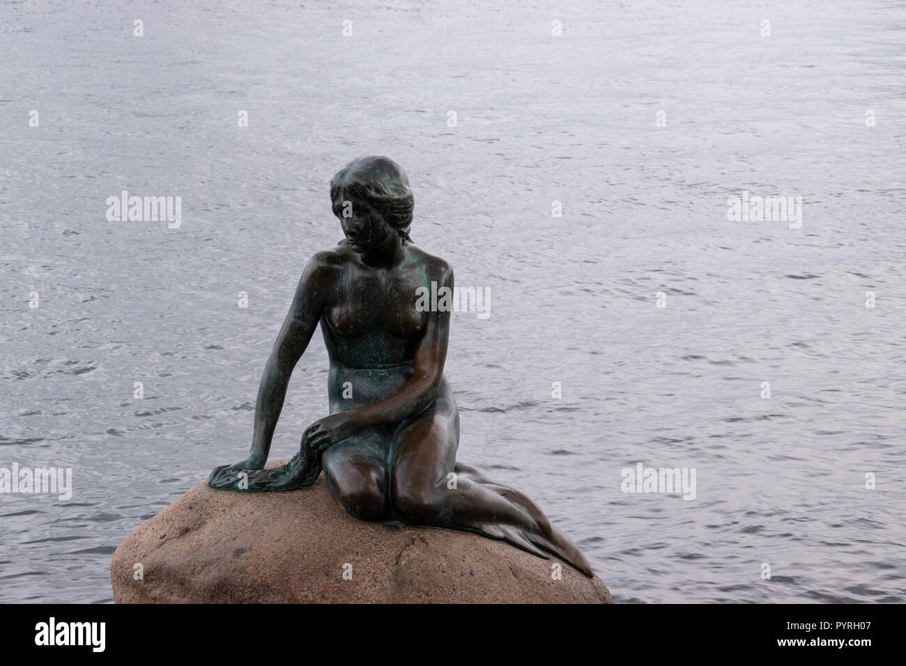 The Little Mermaid (De lille Havfrue) is a bronze statue by Edvard Eriksen along the Langelinie ...
