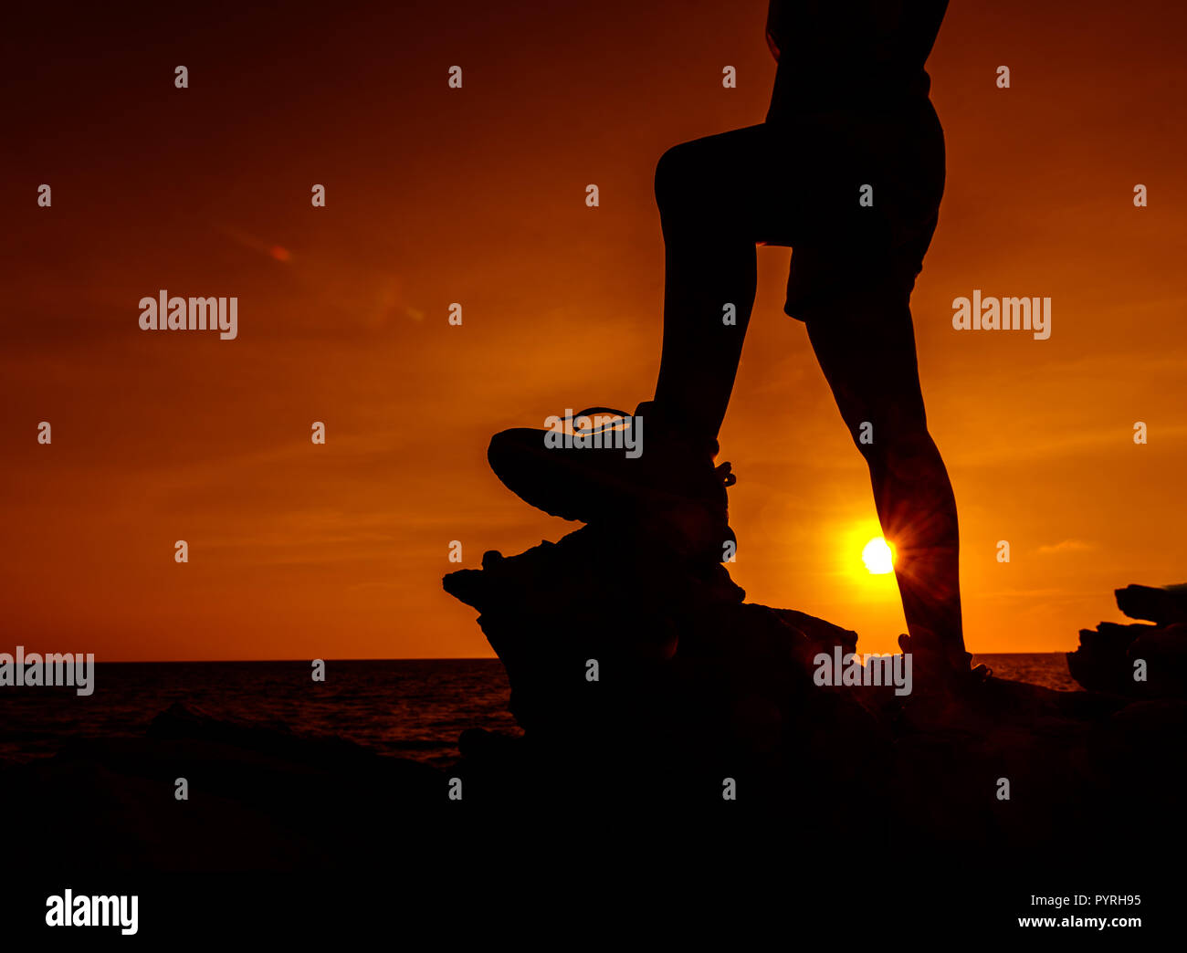 Sporty woman climbing on the cliff. Success and goal concept. Strong ...