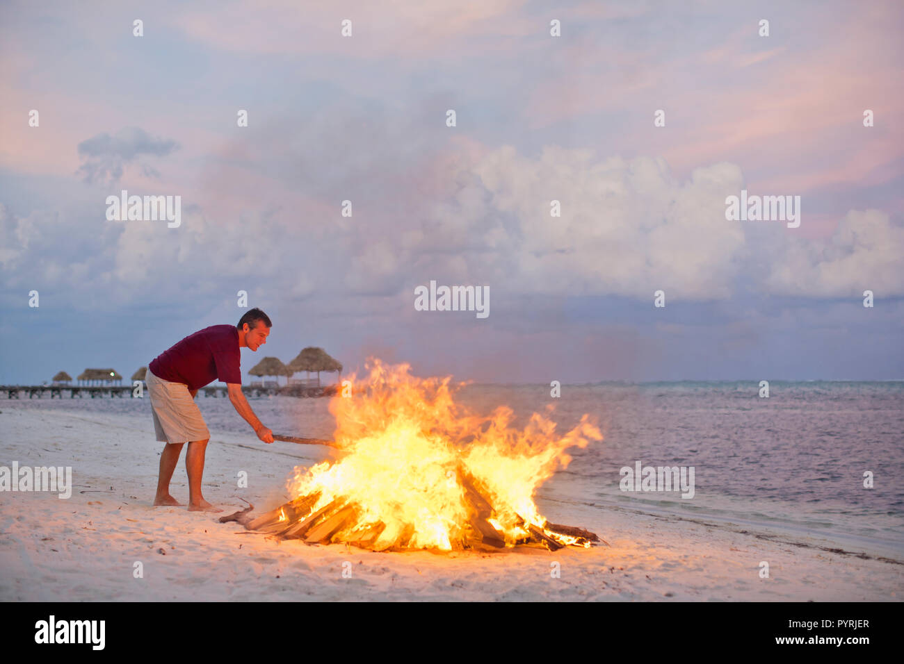 Poking campfire hi-res stock photography and images - Alamy