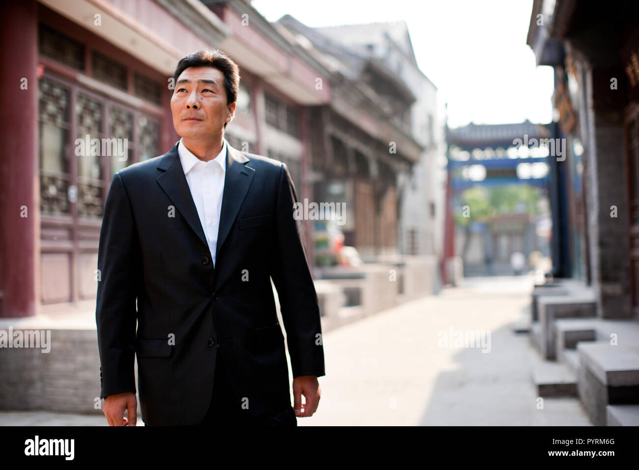 Pensive middle aged chinese man hi-res stock photography and images - Alamy
