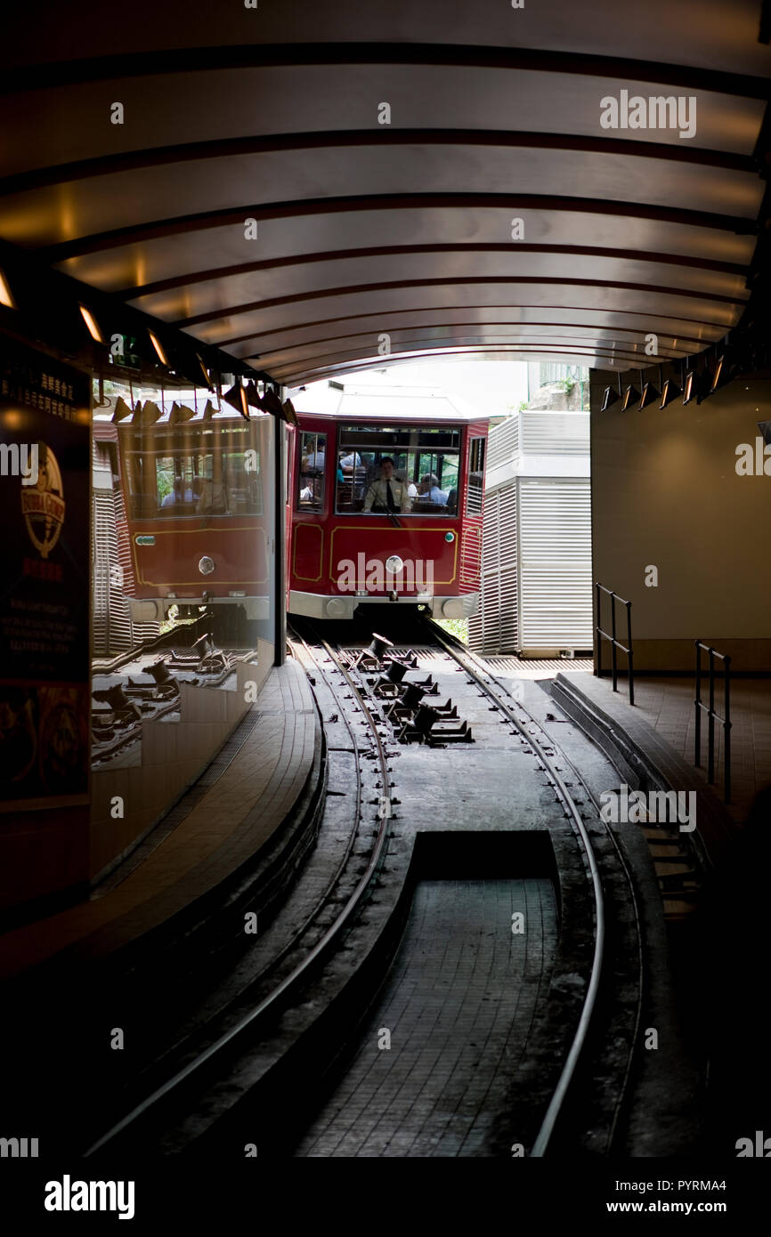 Tram entering a tunnel in an urban city Stock Photo - Alamy