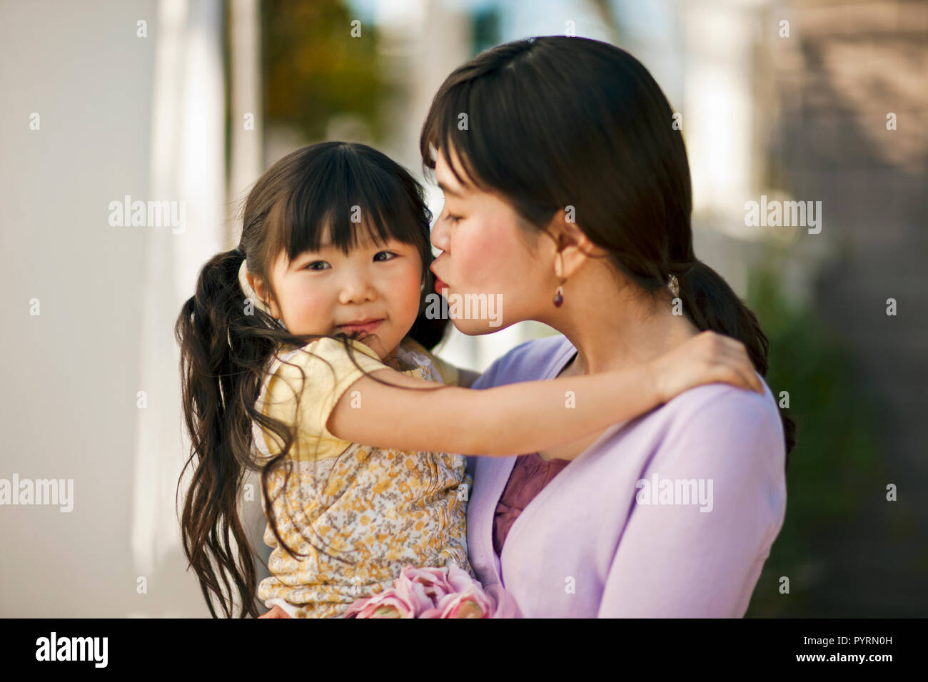 Loving mother holds child on hi-res stock photography and images - Alamy