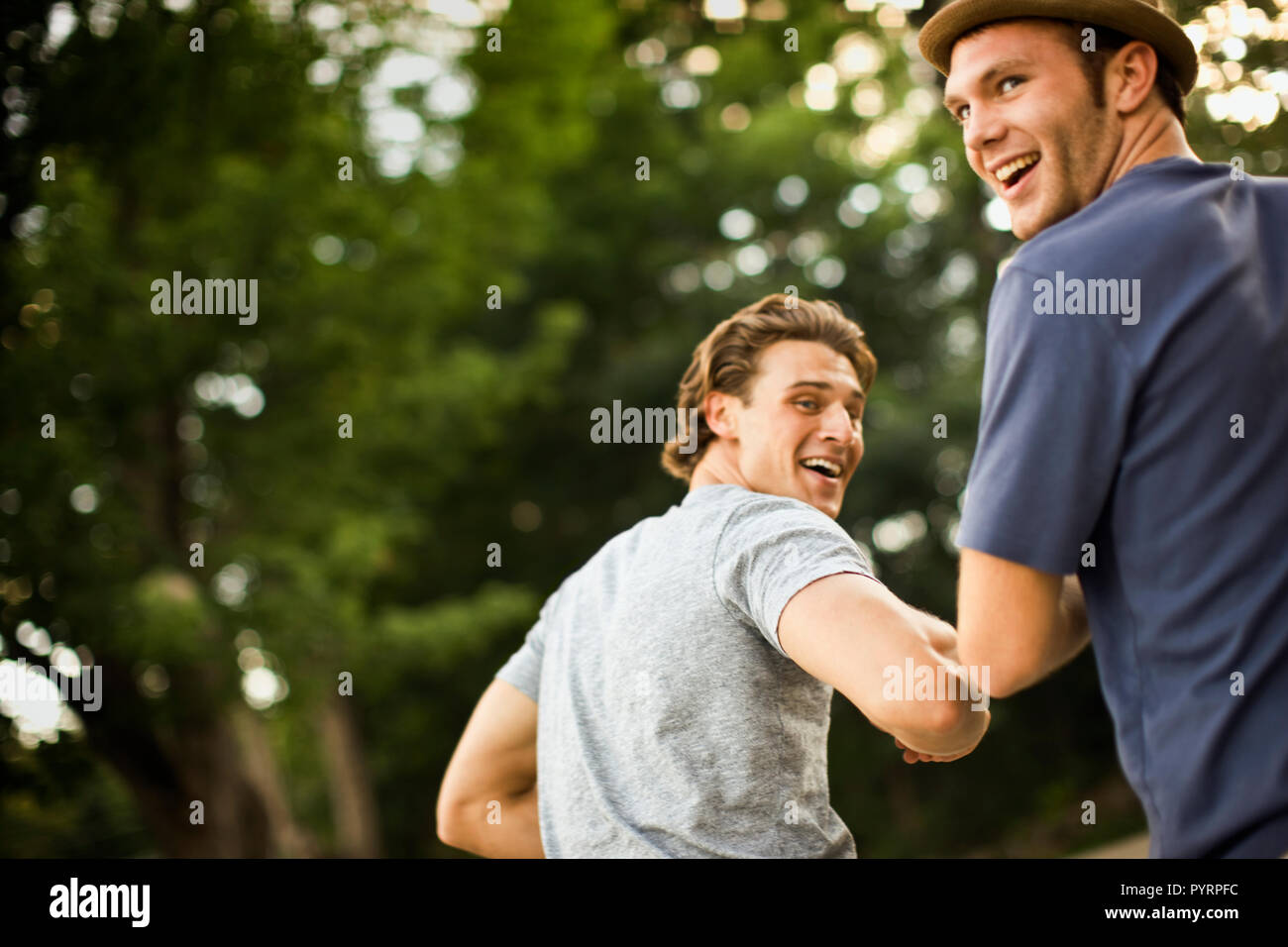 Two male friends goofing around Stock Photo - Alamy