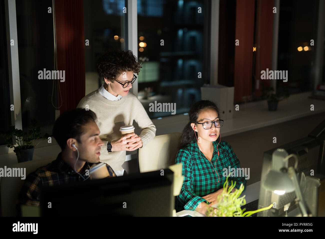 Team computer business dark night hi-res stock photography and images ...