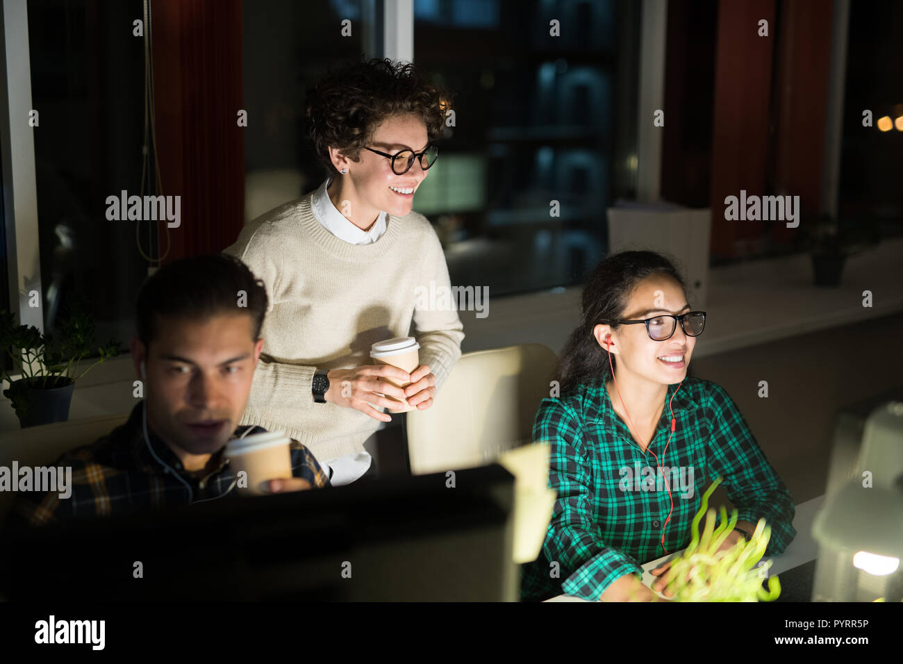Business Team Working at Night Stock Photo - Alamy
