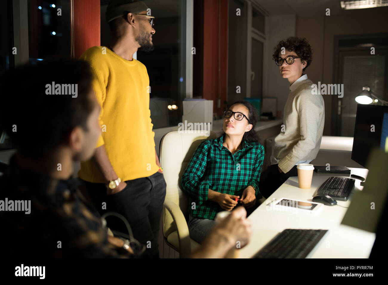 Business Team Working at Night Stock Photo - Alamy