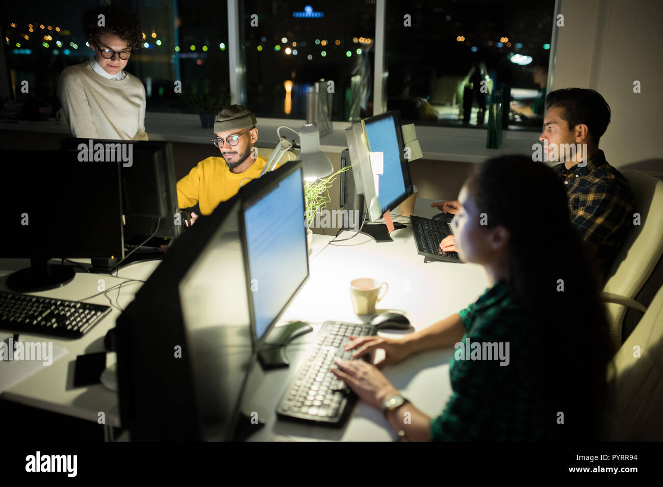 People Working Late Stock Photo - Alamy